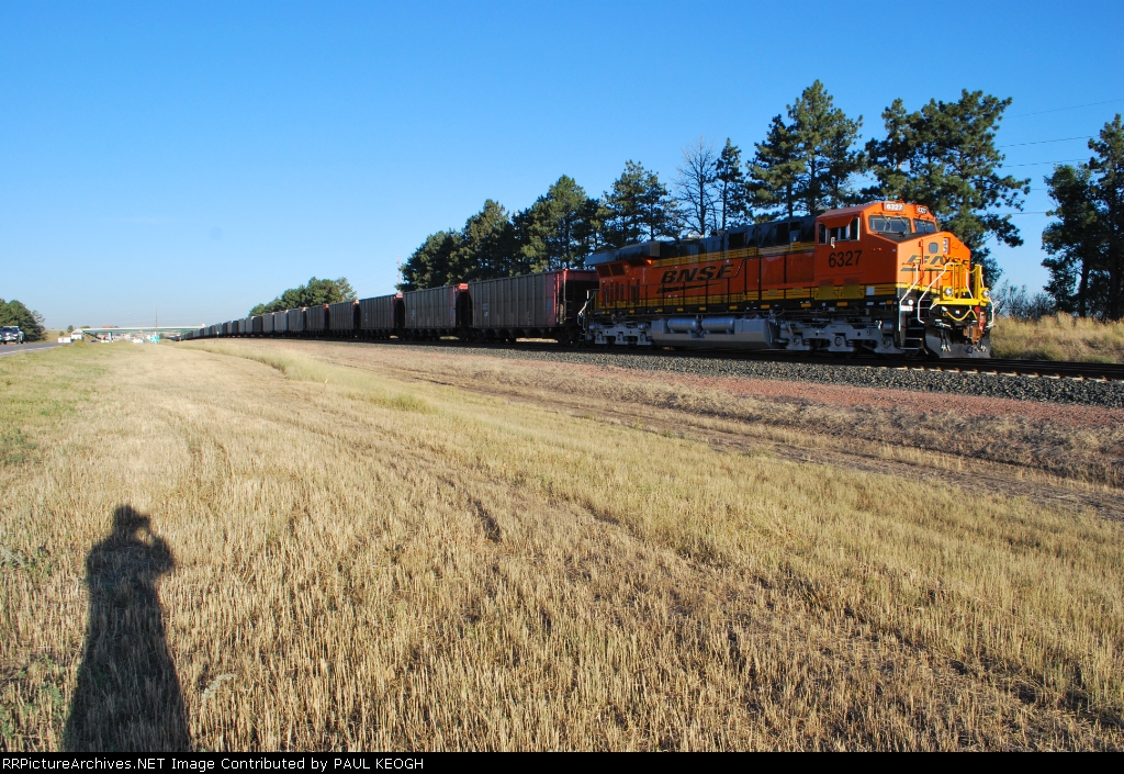 With me in the foreground BNSF 6327 rear DPU starts to pull west out of town with BNSF 6329 AND ...